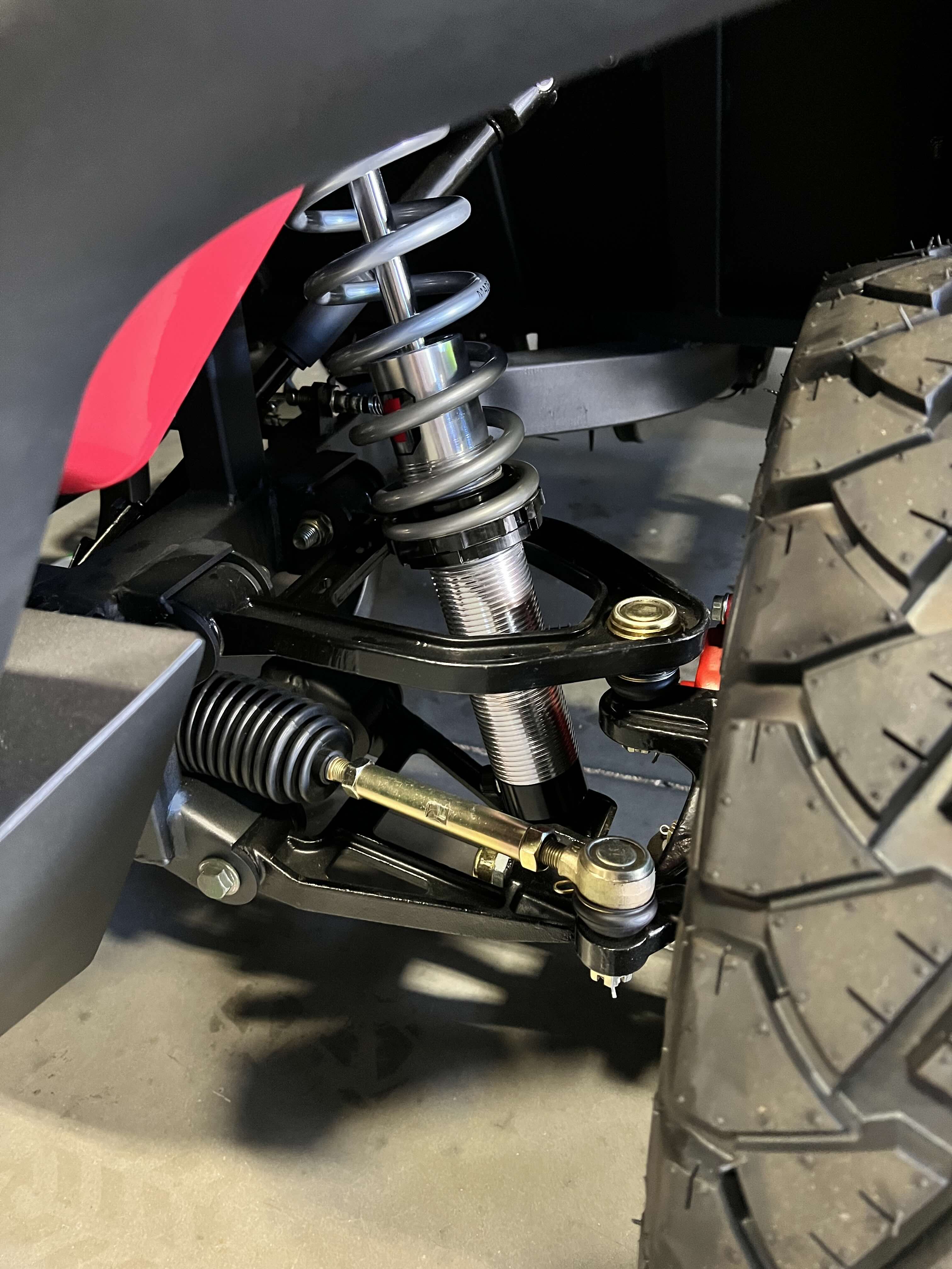 Double Wishbone vs. MacPherson Strut Suspension – NEVO Golf Carts